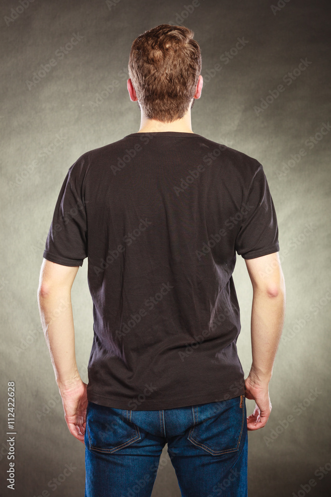 Back view man guy in blank shirt with copy space. Stock Photo | Adobe Stock