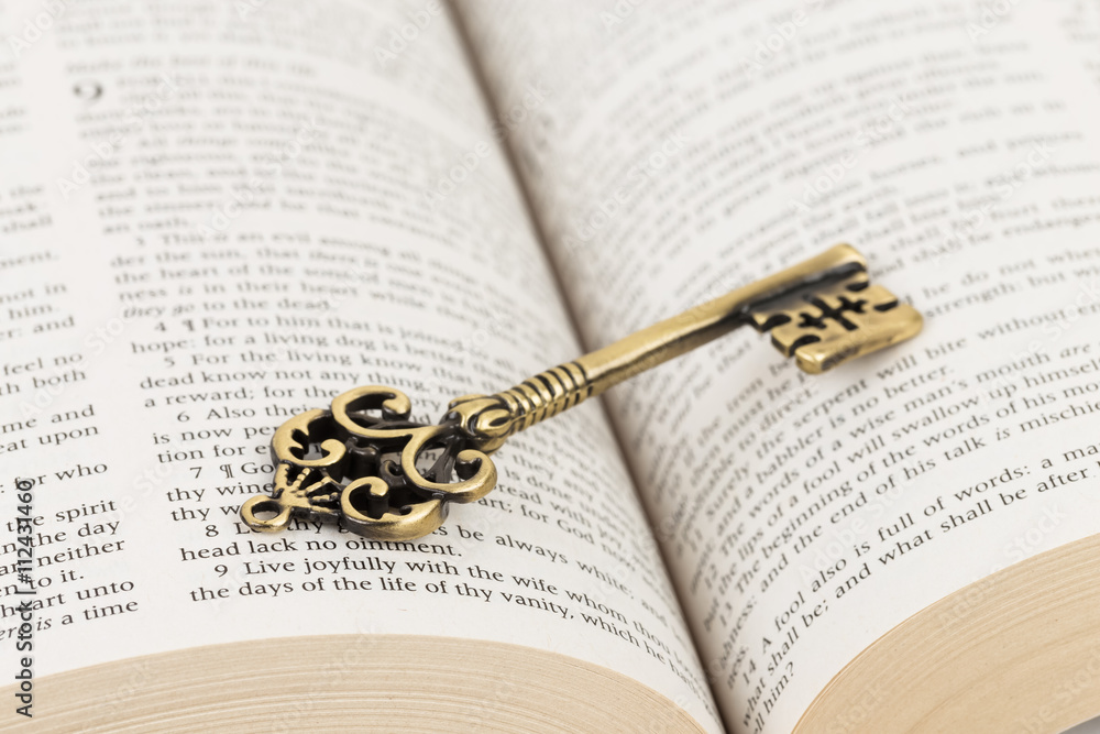 Vintage key on holy bible page concept theology study Stock Photo ...