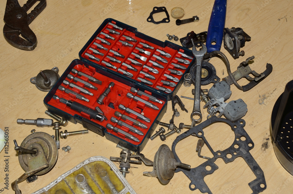 Mechanical tools laid out on a work table. Industrial mechanical tools ...