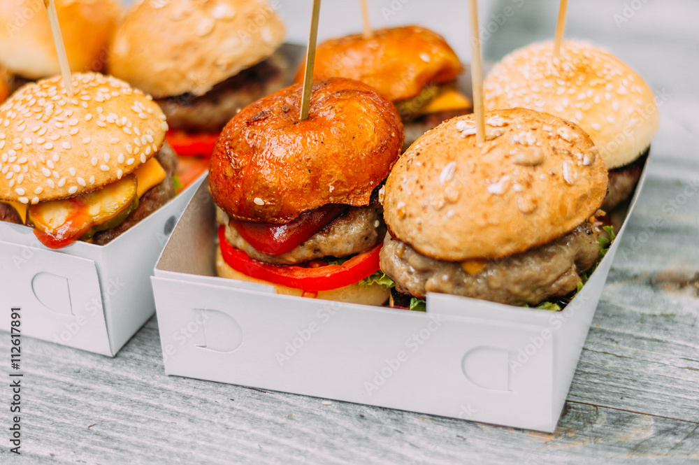 mini hamburgers, mini burgers, party food, finger food served Stock ...