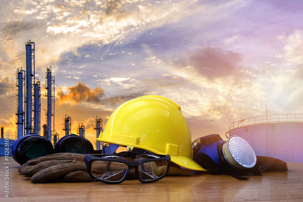 Set of safety work wear on tanker refinery background , image ...