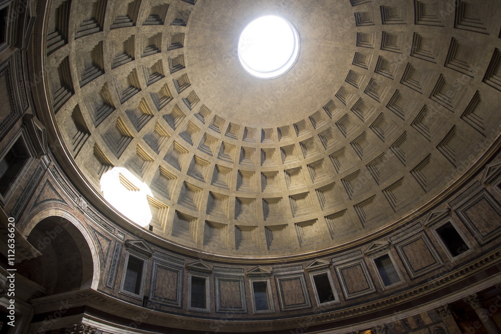 Interior photo of the Pantheon in Rome. you can see the famous ray of ...