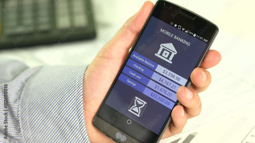 Banking transaction on a mobile banking application on a smartphone ...