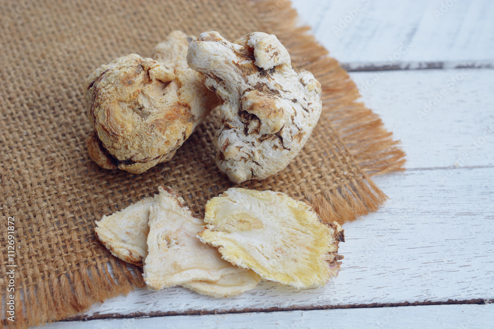 dang gui, angelica sinensis, dang gui ginseng on wooden background ...