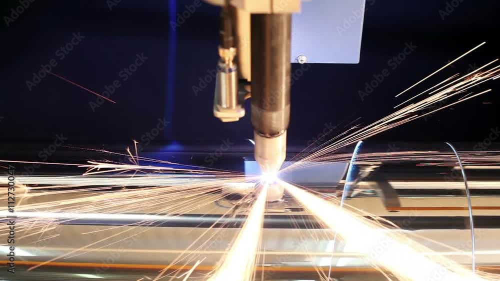 Manufacture of metal flues and ventilation systems. Laser machine cuts ...