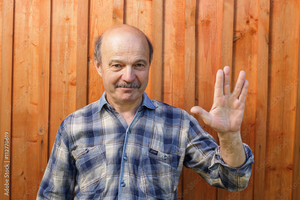 Vulcan greeting. Vulcan Salute. elderly man with a mustache and a bald ...