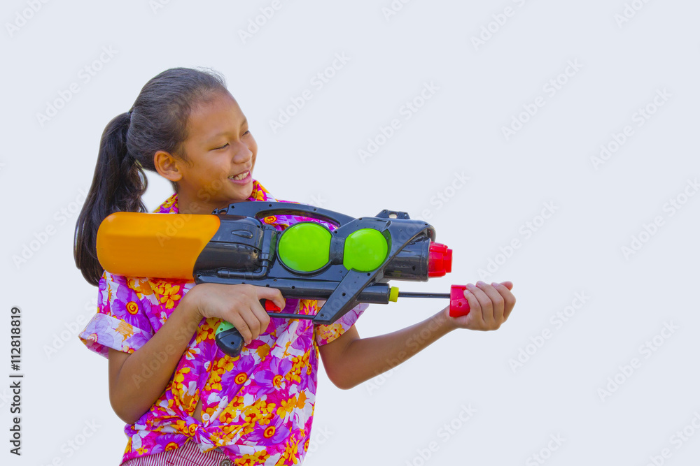 Asian girl holding a plastic water gun festival in Thailand-white ...