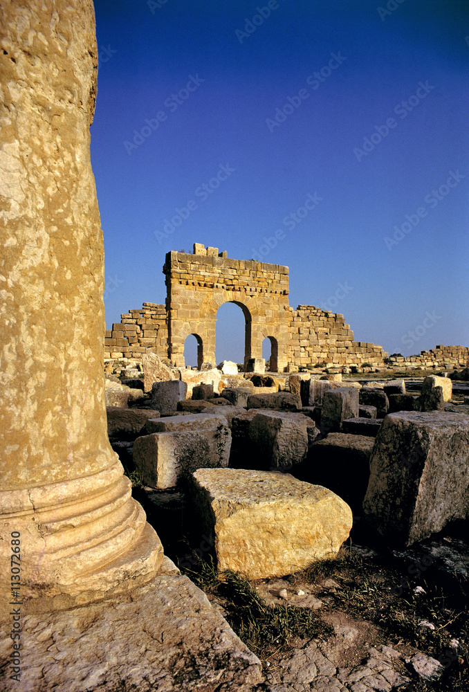 Three arches are examples of the well-preserved Roman ruins of Sufetula ...