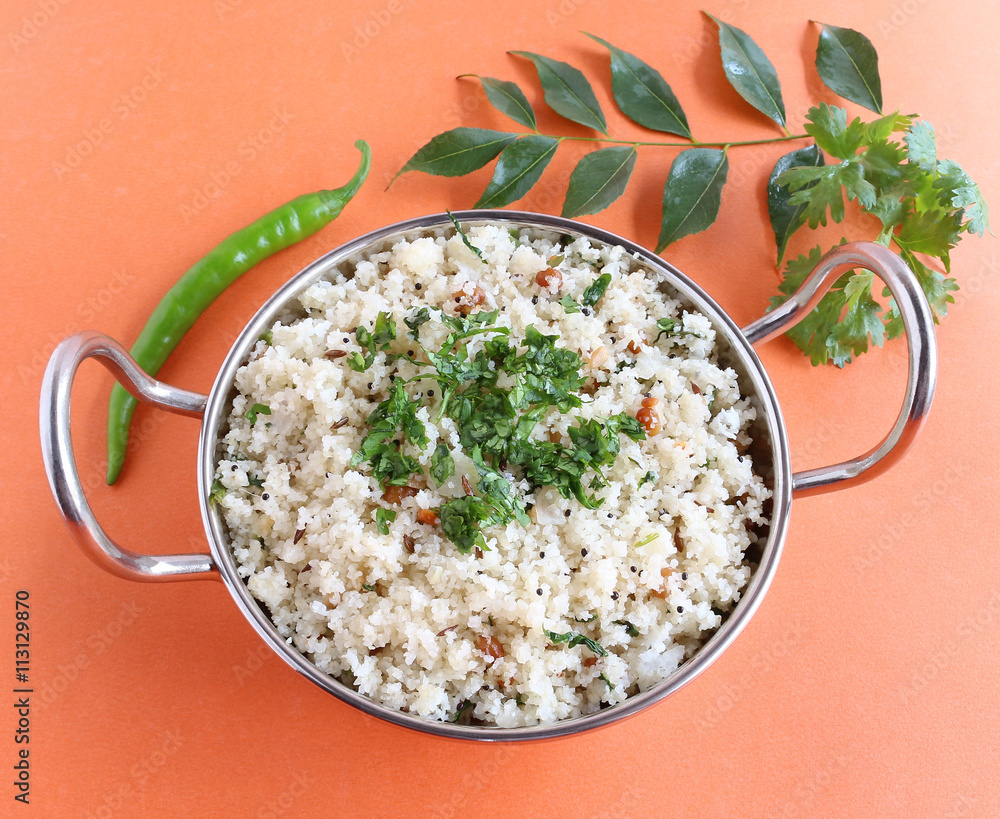 Foto Stock Rice rava upma, a south Indian vegetarian food, is made from ...
