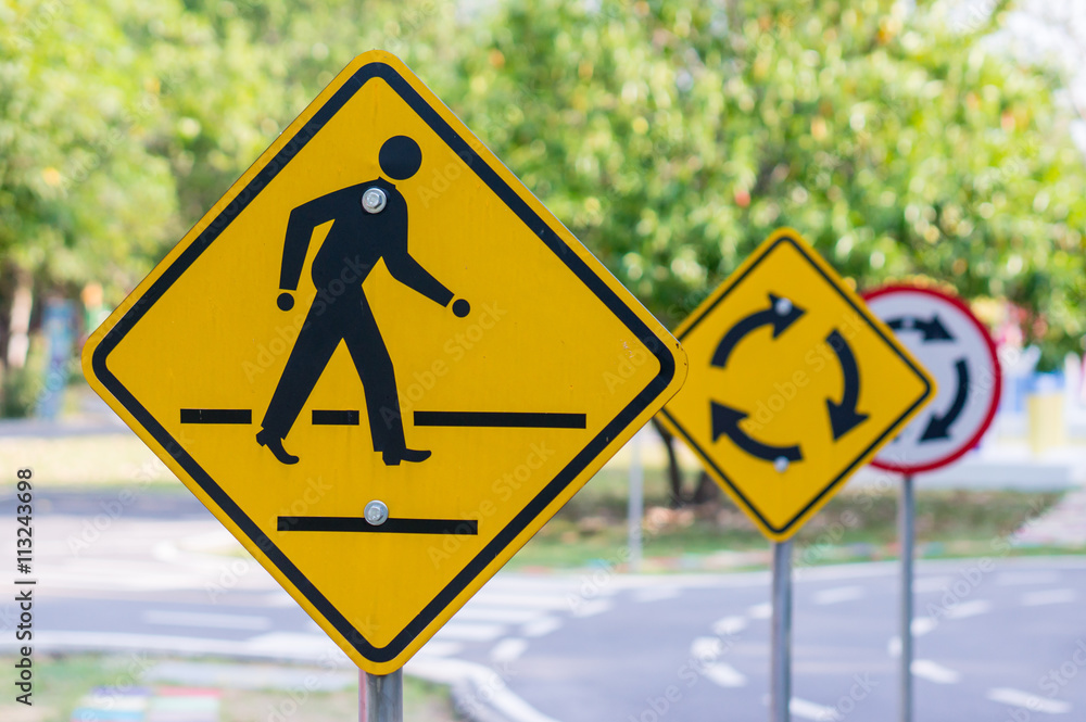 road warning sign with sky with man walking symbol Stock Photo | Adobe ...