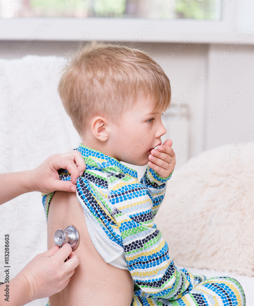 doctor examining little boy with stethoscope Stock Photo | Adobe Stock