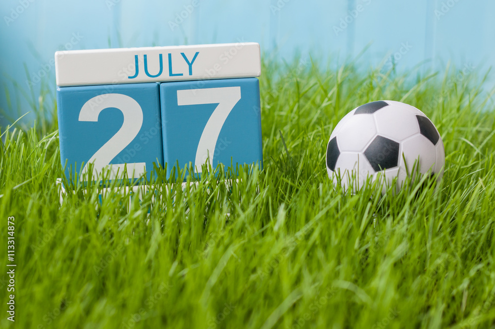 July 27th. Image of july 27 wooden color calendar on greengrass lawn ...