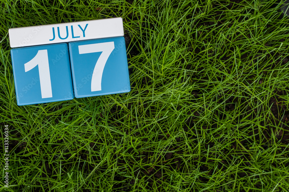 July 17th. Image of july 17 wooden color calendar on greengrass lawn ...