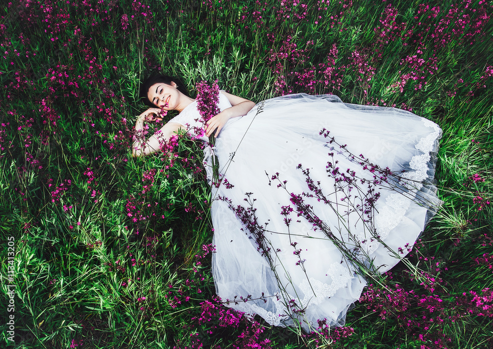 Girl Laying In Flowers
