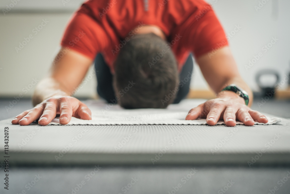 Sporty man stretching back before gym workout. Fitness strong male ...
