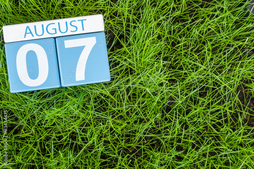 August 7th. Image of august 7 wooden color calendar on green grass lawn ...