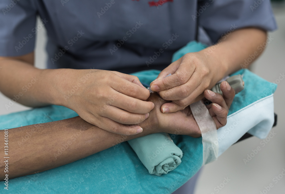 asian anesthesiologist made arterial line Stock Photo | Adobe Stock