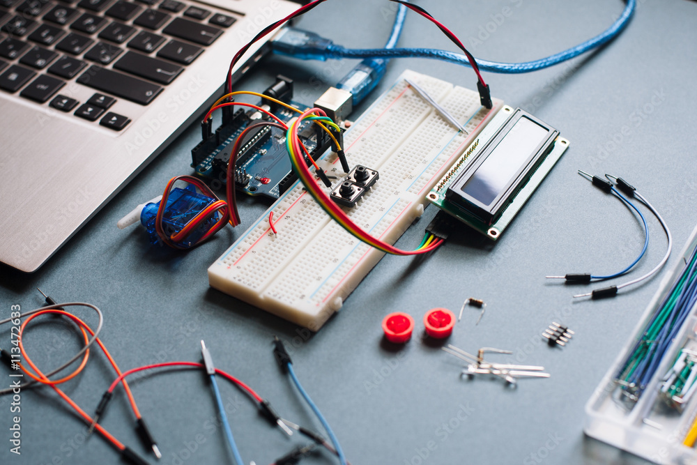 Engineer background with microcontroller and different details on black ...