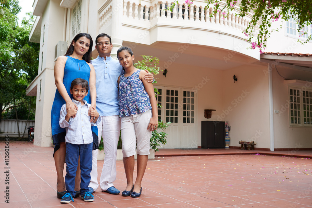 Family and their house Stock Photo | Adobe Stock