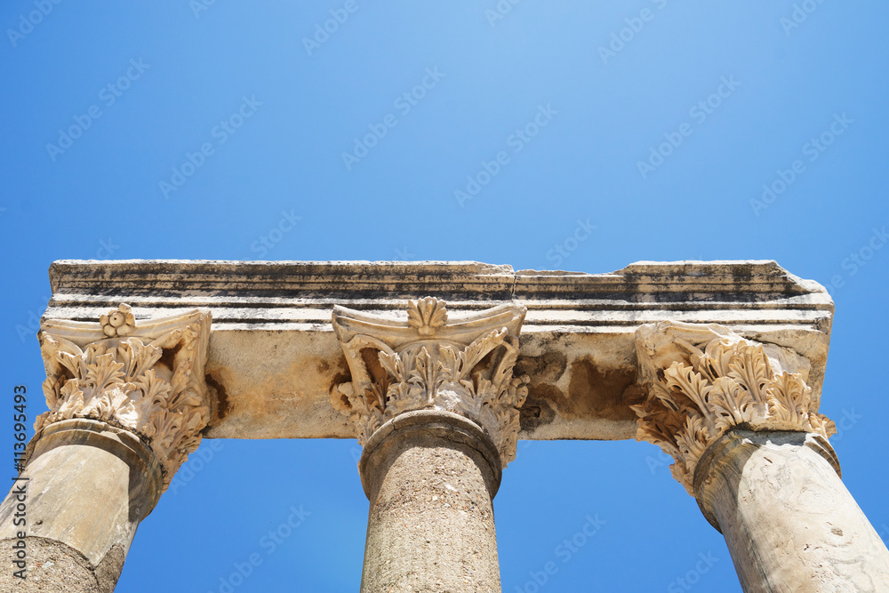 Ionic column capital with scrolling volutes and blue sky.doric c Stock ...