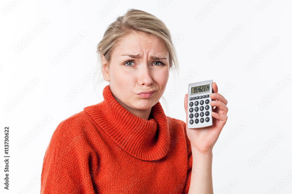 disillusioned young blond woman with symbol of high costs Stock Photo ...