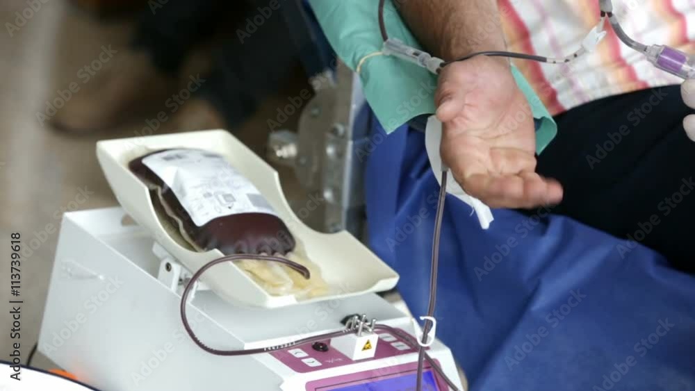 Vídeo do Stock: Volunteers are donating blood at the World Blood Donor ...