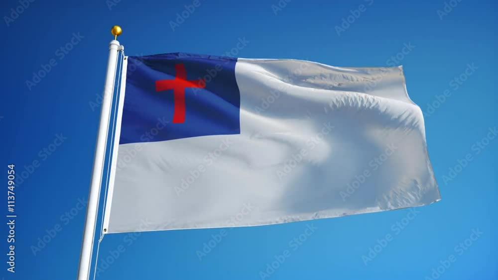 Christian flag waving in slow motion against clean blue sky, seamlessly ...