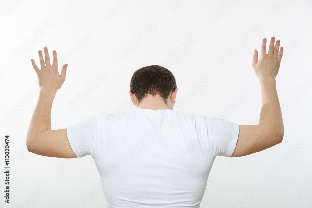 Young man turning back and capitulating Stock Photo | Adobe Stock