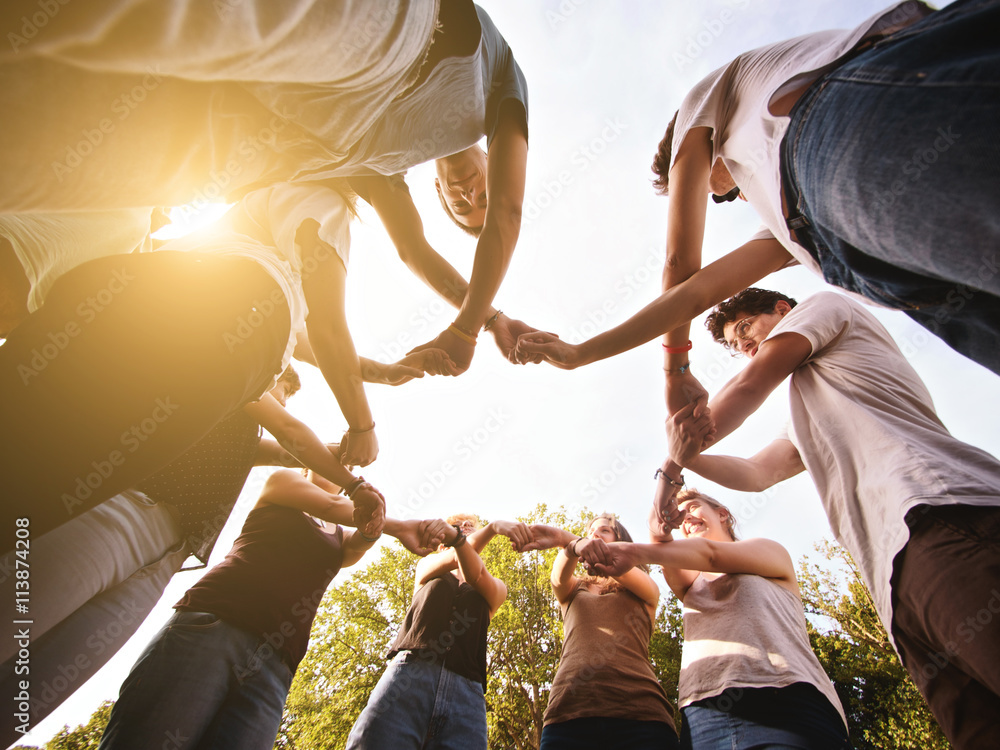 large group of friends together in a park having fun Stock Photo ...