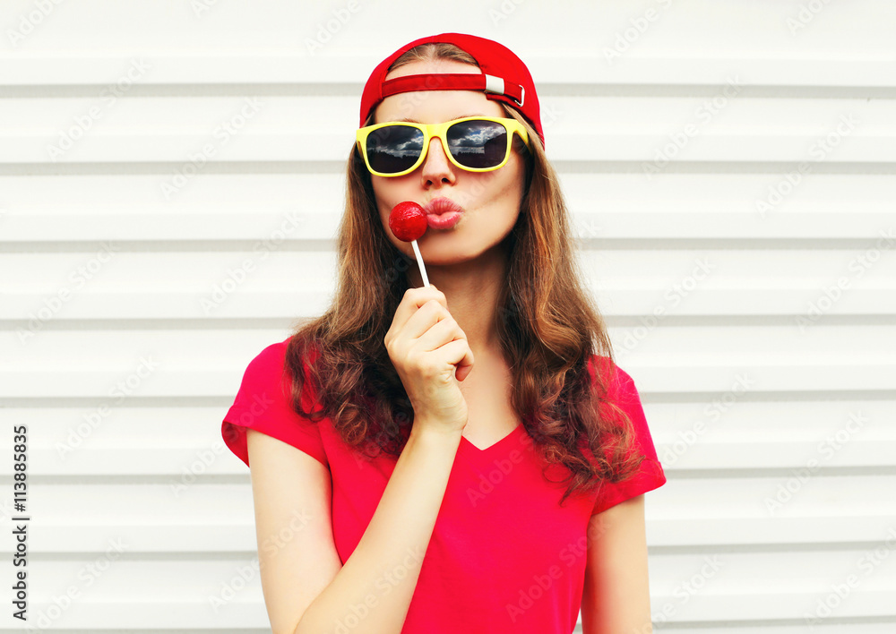 Fashion portrait pretty cool girl with lollipop over white backg Stock ...