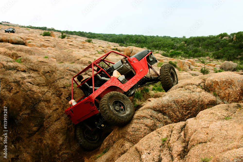 Red Jeep 4x4 rock crawling Stock Photo | Adobe Stock