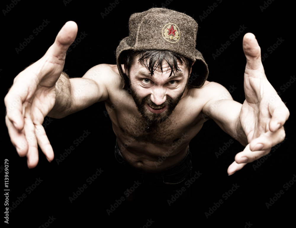 Dark portrait of scary evil sinister bearded man with smirk, makes ...