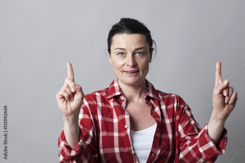 smiling beautiful woman asking question, warning or showing something ...