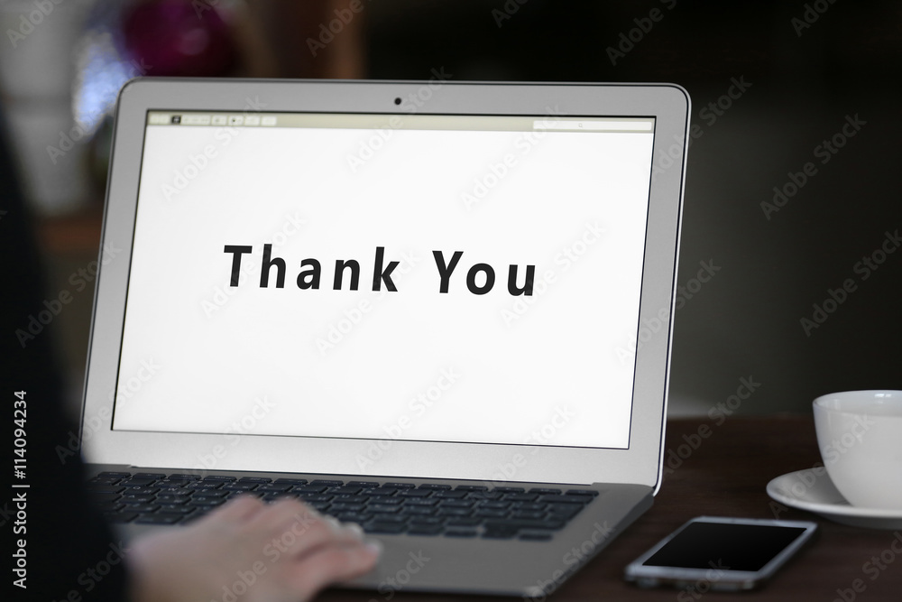 Text Thank You on screen of net book Stock Photo | Adobe Stock