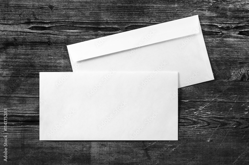 Blank white paper envelopes. template. Photo of blank envelopes on dark ...