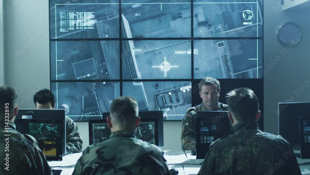 Group of Military IT Professionals on Briefing in Monitoring Room ...