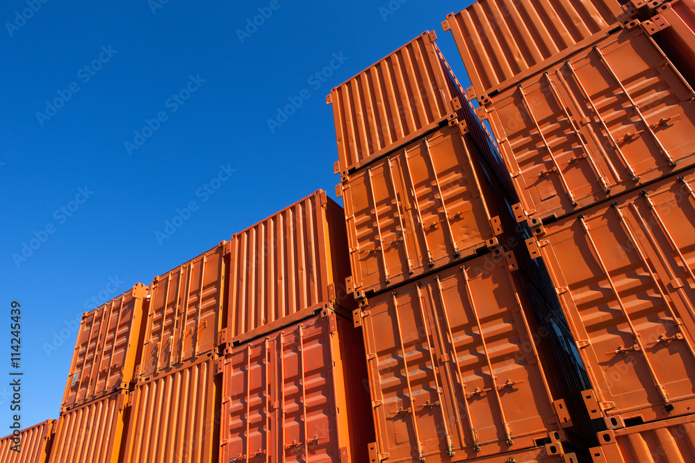 Stacks of orange shipping containers Stock Photo | Adobe Stock