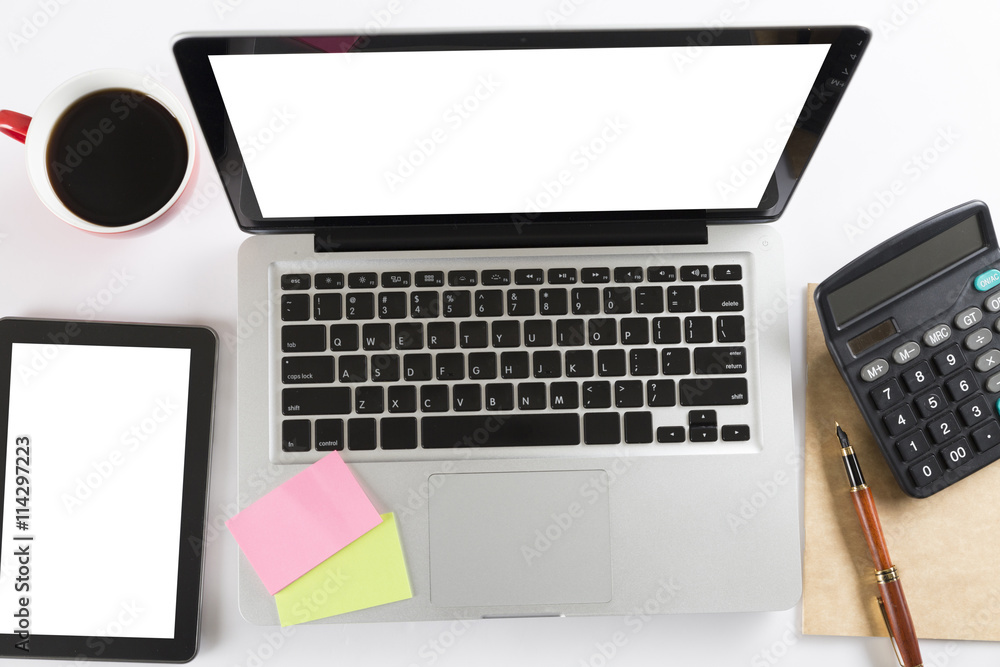 laptop, calculator and tablet on white background - top view Stock ...