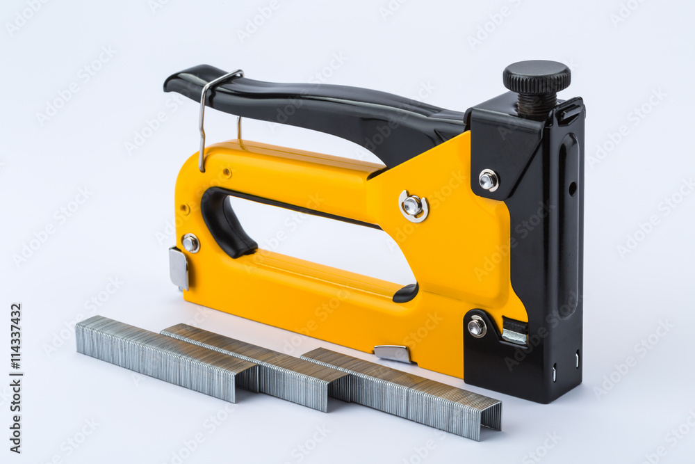 Carpenter stapler with staples Stock Photo | Adobe Stock
