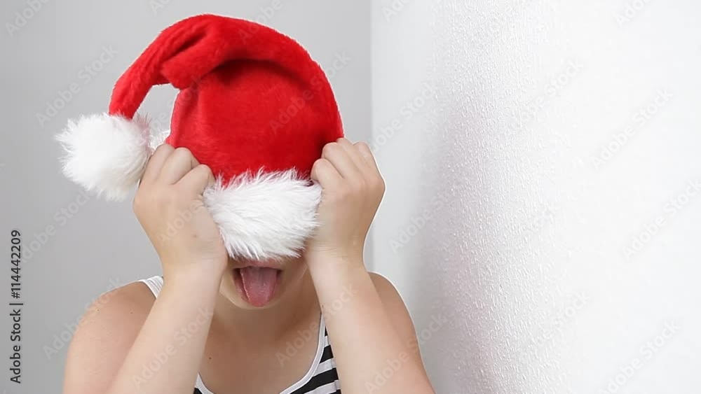 girl with santa hat over the eyes is hacked off christmas Stock Video ...