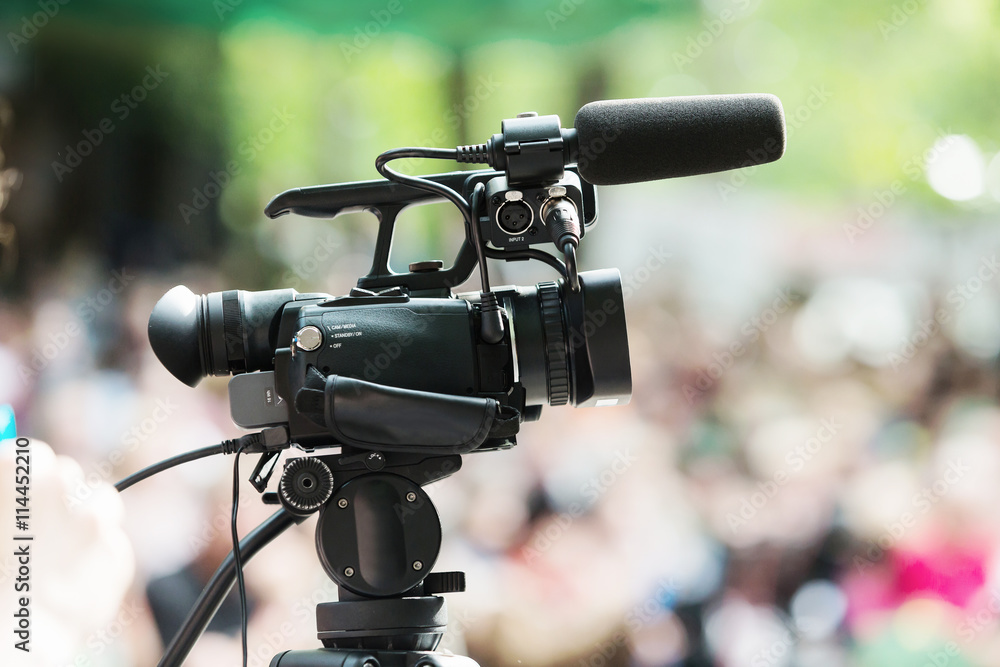 portable camera with a blurred background Stock Photo | Adobe Stock