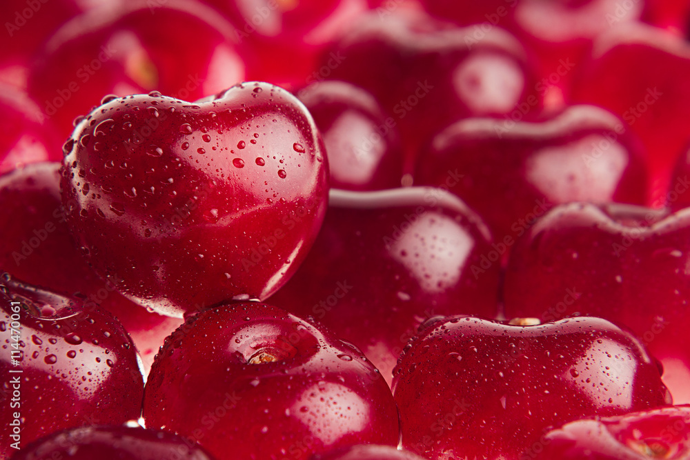 Cherry background with cherry in form of heart. Ripe fresh rich ...