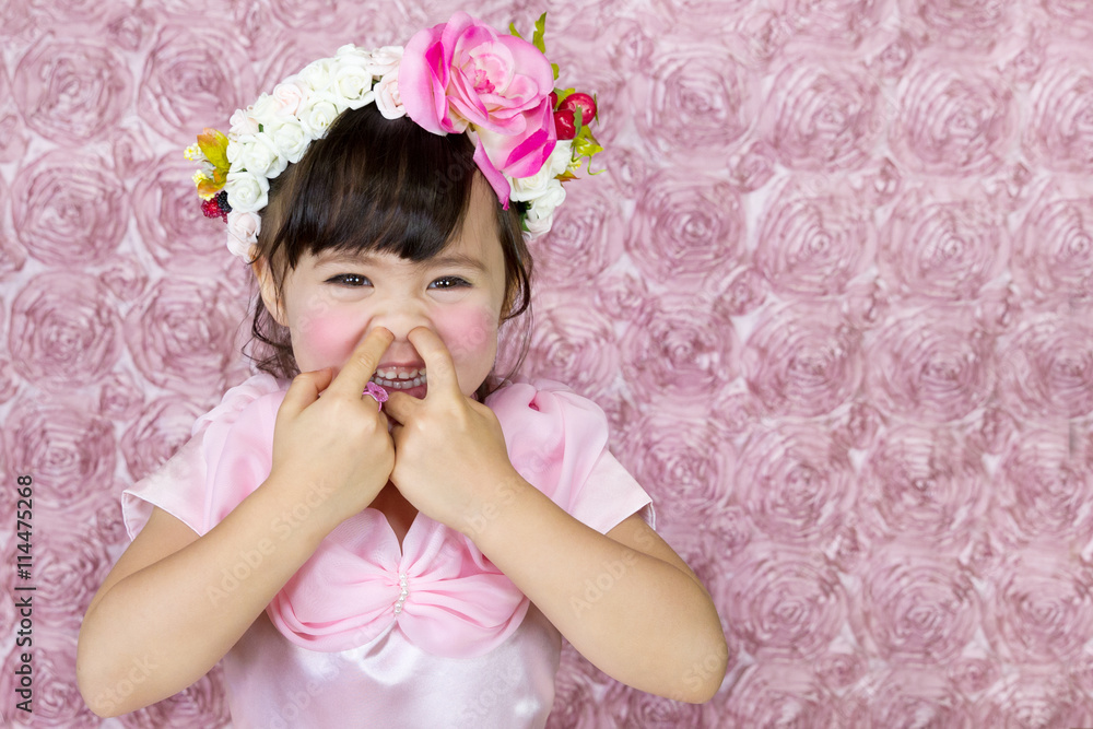 Plugging her nose She is playfully plugging her nose Stock Photo ...