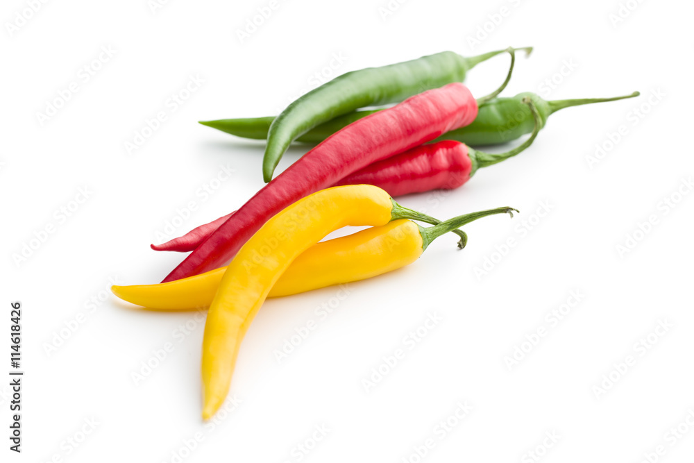 Different colors chilli peppers. Stock Photo | Adobe Stock