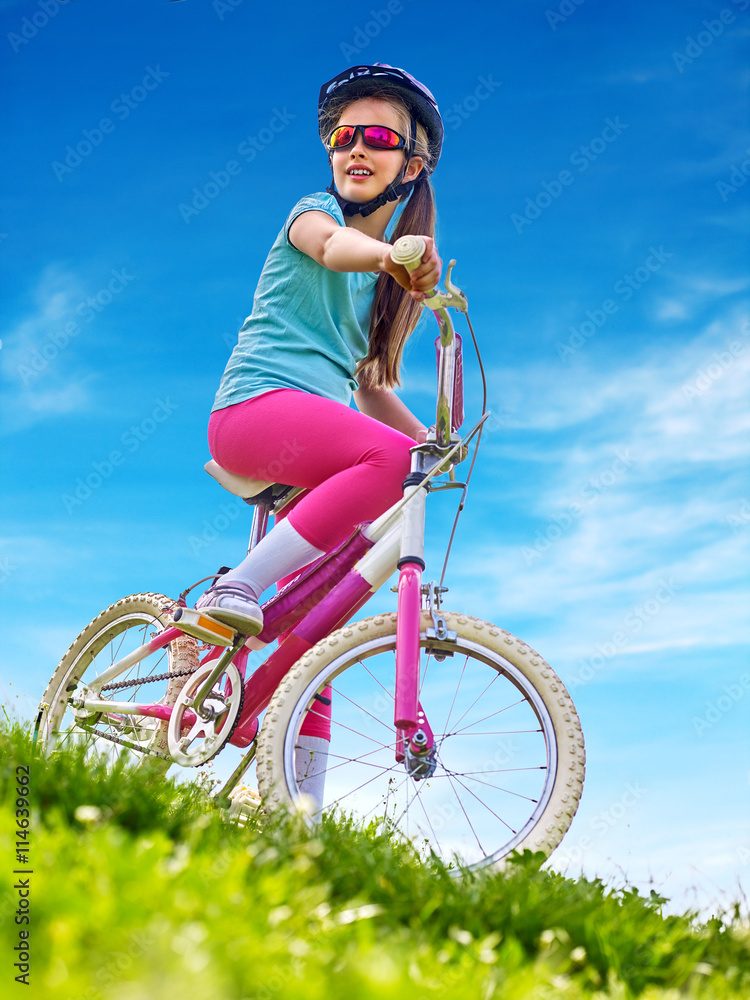 Bikes cycling child. Girl rides bicycle. Little girl in cycling ...