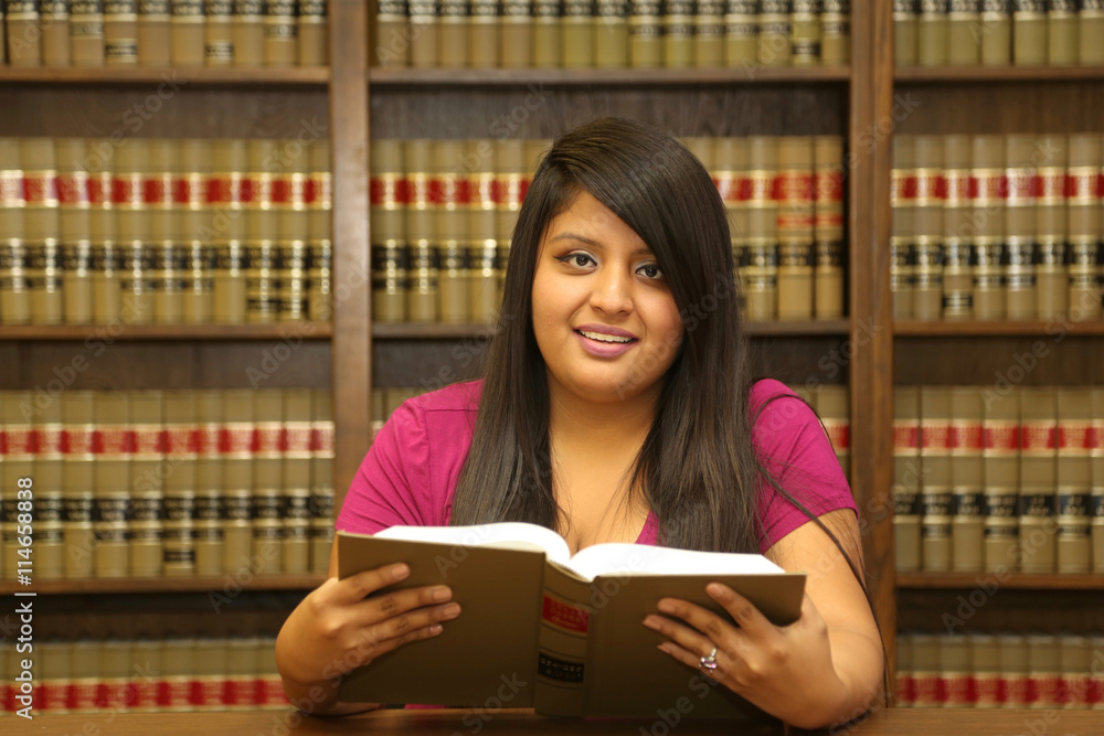 Young attractive hispanic paralegal Stock Photo | Adobe Stock