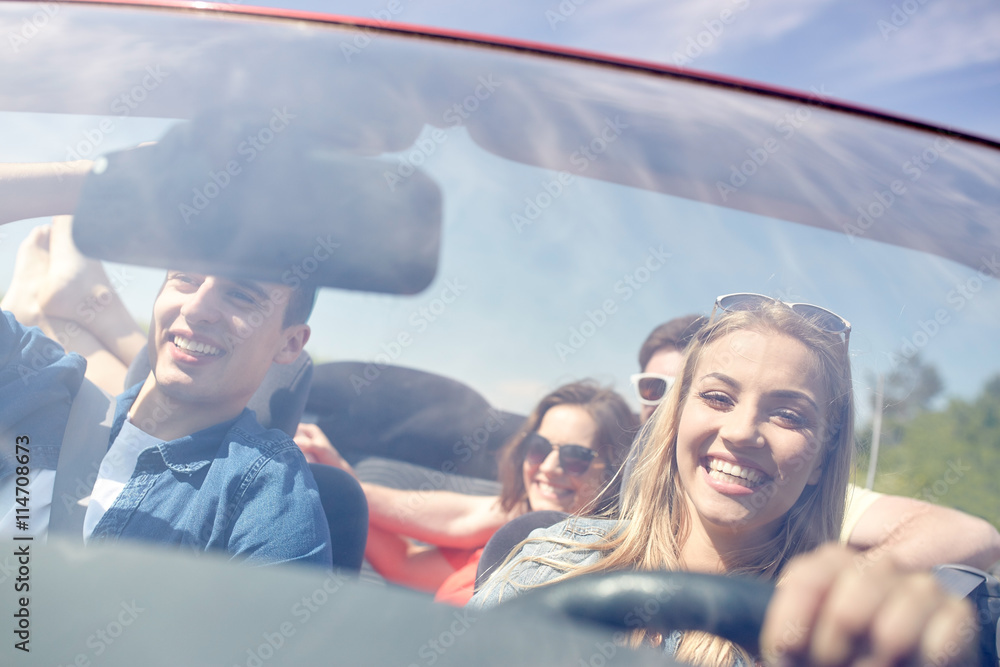 happy friends driving in cabriolet car Stock Photo | Adobe Stock