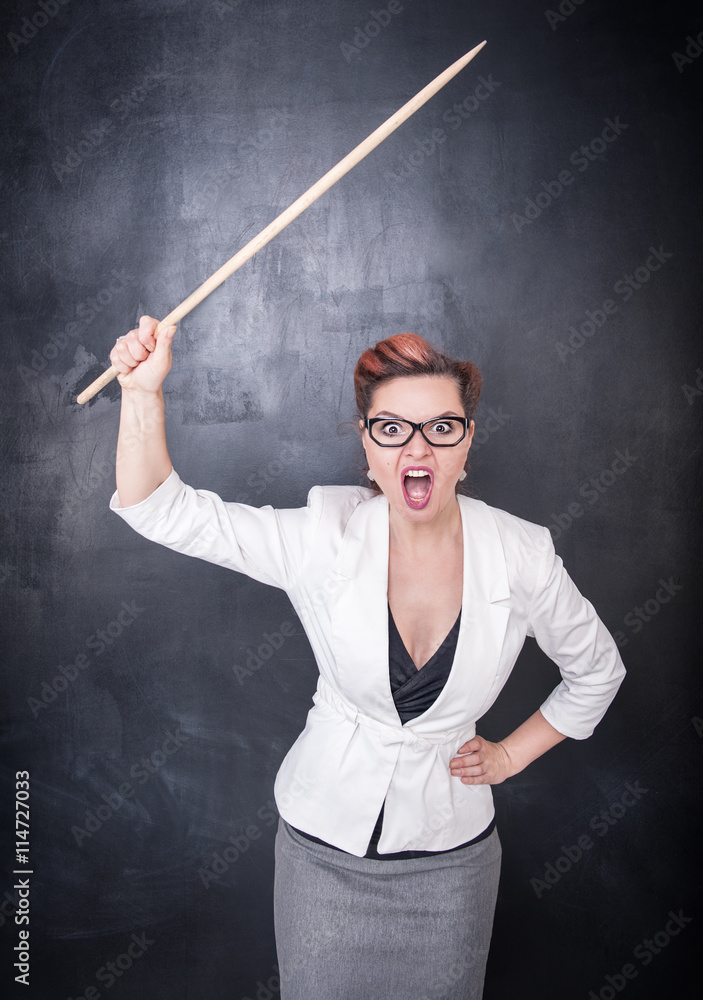 Angry screaming teacher with pointer on blackboard background Stock ...