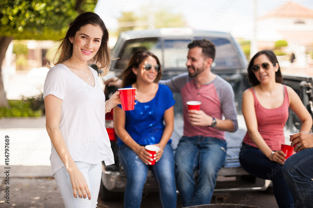 Beautiful woman hanging out with friends Stock Photo | Adobe Stock