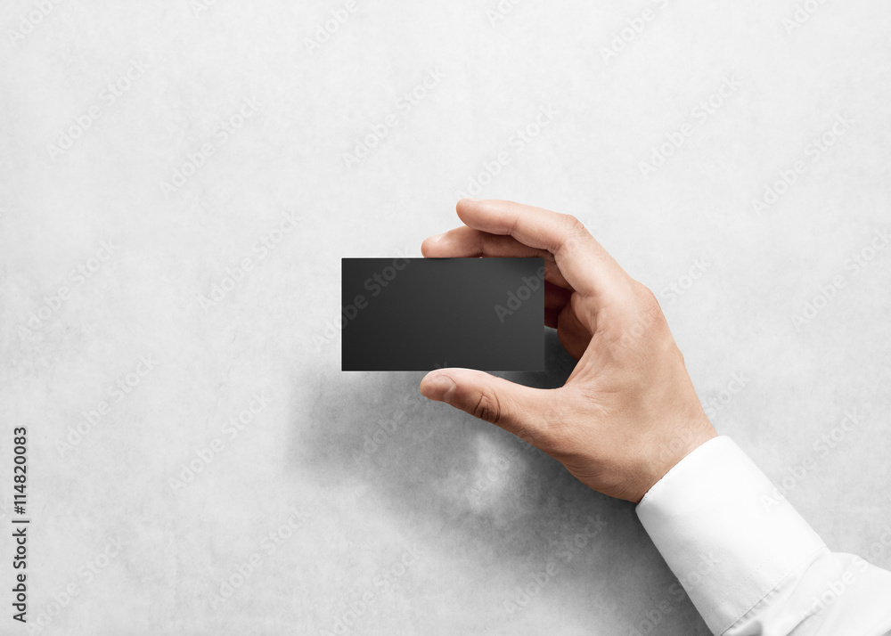 Hand hold blank plain black business card design mockup. Clear namecard ...
